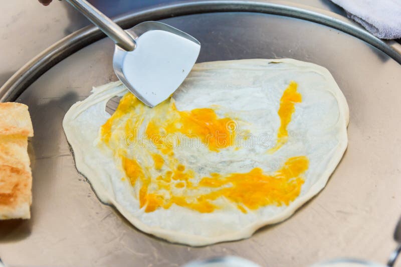 Chef making roti and egg stock photo. Image of sugar - 152196452