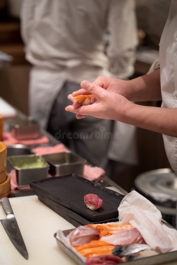 Chef Making Sushi in the Restaurant Stock Photo - Image of delicacy ...