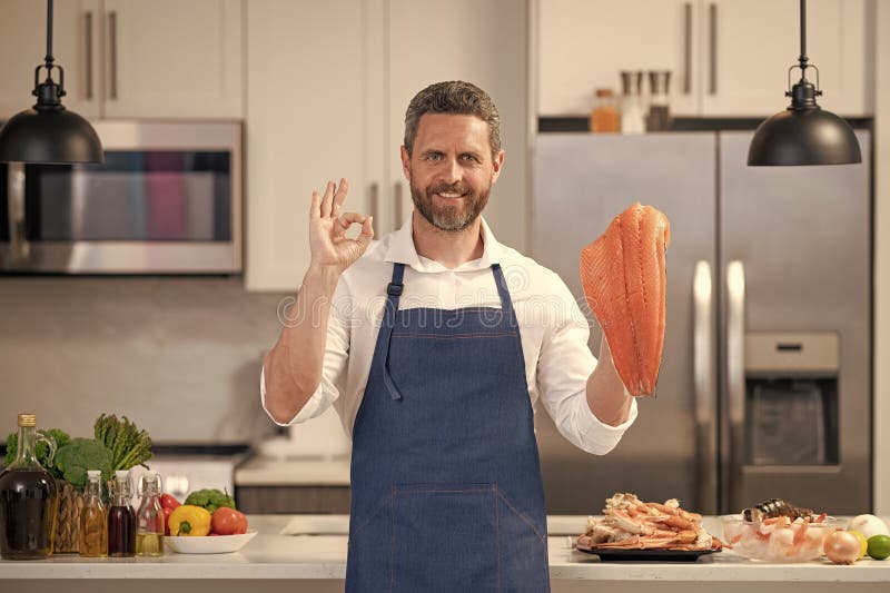 Chef Man Cooking Fish Salmon, Ok. Chef Man Cooking Fish in the Kitchen ...