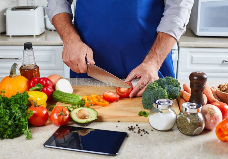 Chef Man Cooking in the Kitchen. Stock Photo - Image of knife, fresh ...