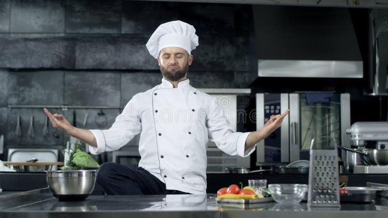 Chef Man Posing at Professional Kitchen. Chef Making Fun in Meditation ...