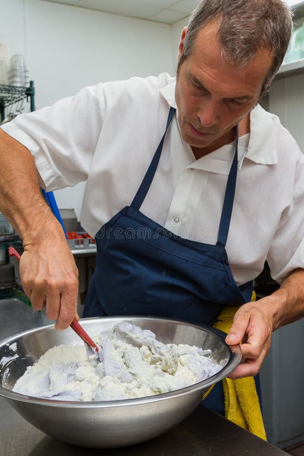 Chef mixing ingredients stock photo. Image of mixer, evening - 59310324