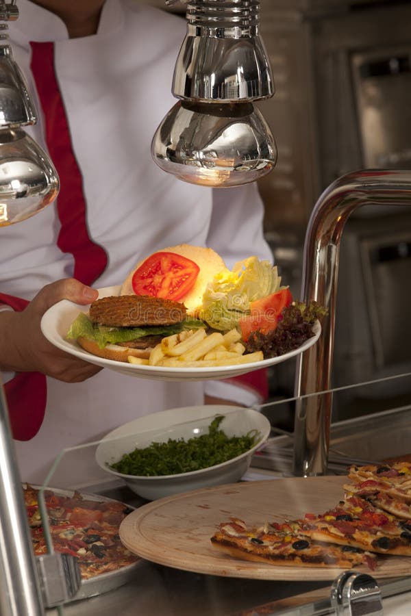 Chef near buffet stock photo. Image of pizza, service - 29562750