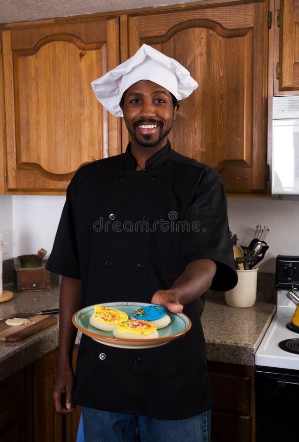 Chef offers Cookies stock photo. Image of smile, offer - 17570536