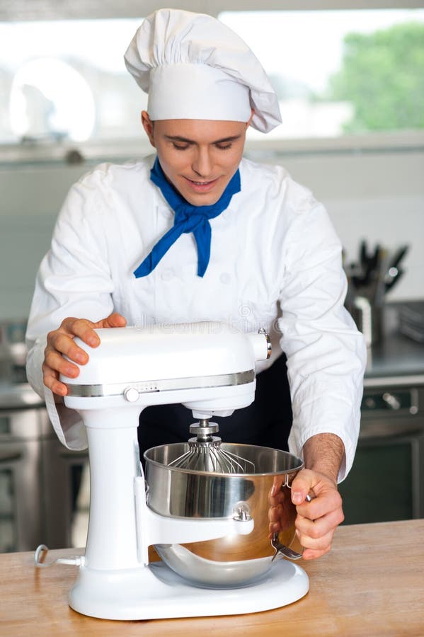 Chef Operating Electric Egg Beater Stock Photo - Image of experienced ...