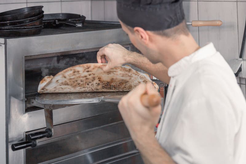 Chef Oven Baking Pizza, Commercial Kitchen Stock Image - Image of ...
