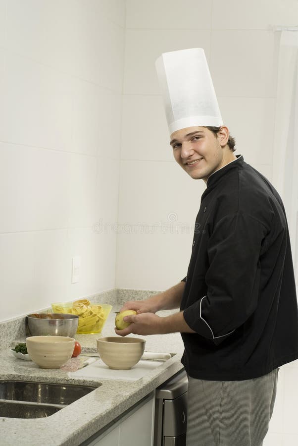 Chef Peeling Potatoes stock photo. Image of chef, culinary - 6340376