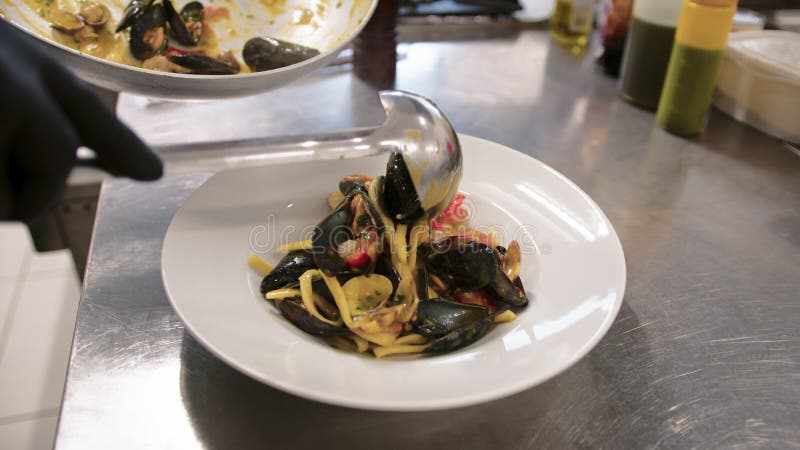 Chef Plating the Seafood Spaghetti Dish Stock Footage - Video of ...