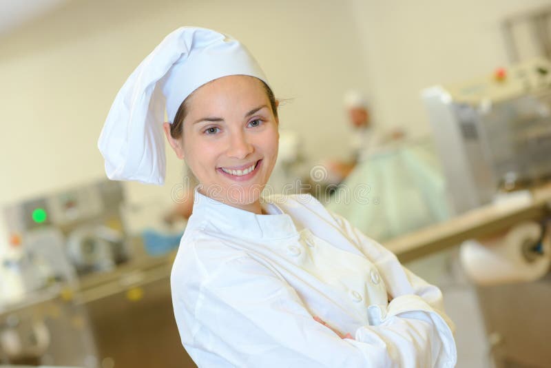 Chef posing inside kitchen stock image. Image of kitchen - 90834915
