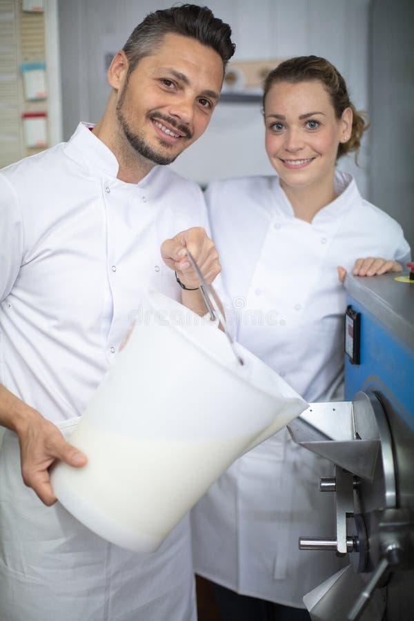 Chef Pouring Basis into Ice Cream Freezer Machine Stock Photo - Image ...