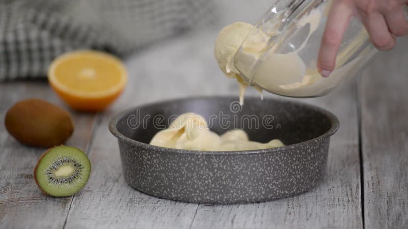 Chef Pouring Cake Batter into Mold before Putting To the Oven Stock ...
