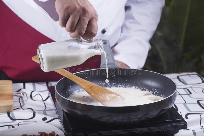 Chef Pouring Fresh Milk To the Pan Stock Image - Image of milk, aroma ...