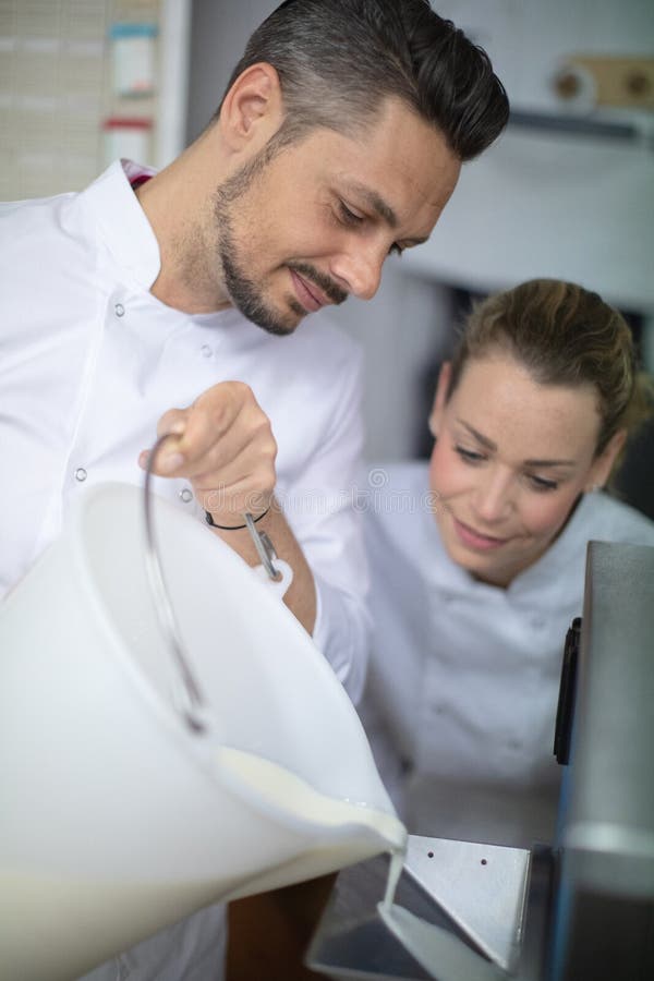 Chef Pouring Liquid into Indutrial Machine Stock Image - Image of ...