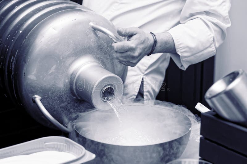 Chef is Pouring Liquid Nitrogen from a Large Dewar Flask, Toned Stock ...
