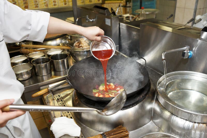 Chef is Pouring Sour Sauce in Wok Stock Photo - Image of vegetable ...