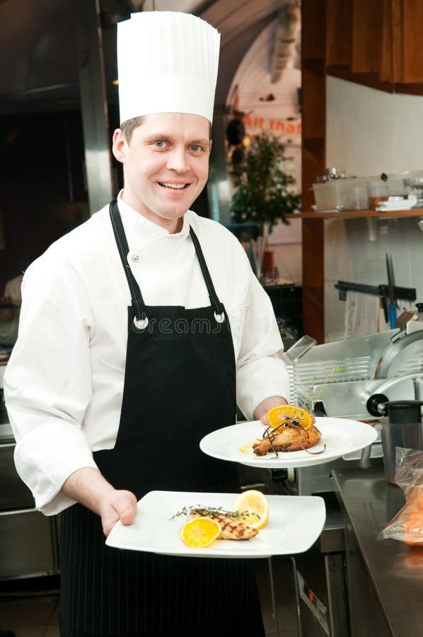 Chef with Prepared Food on Plates Stock Image - Image of cooker ...