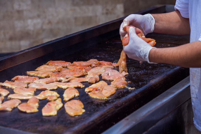 The Chef Prepares Chicken Fillet for Frying. the Process of Preparing ...