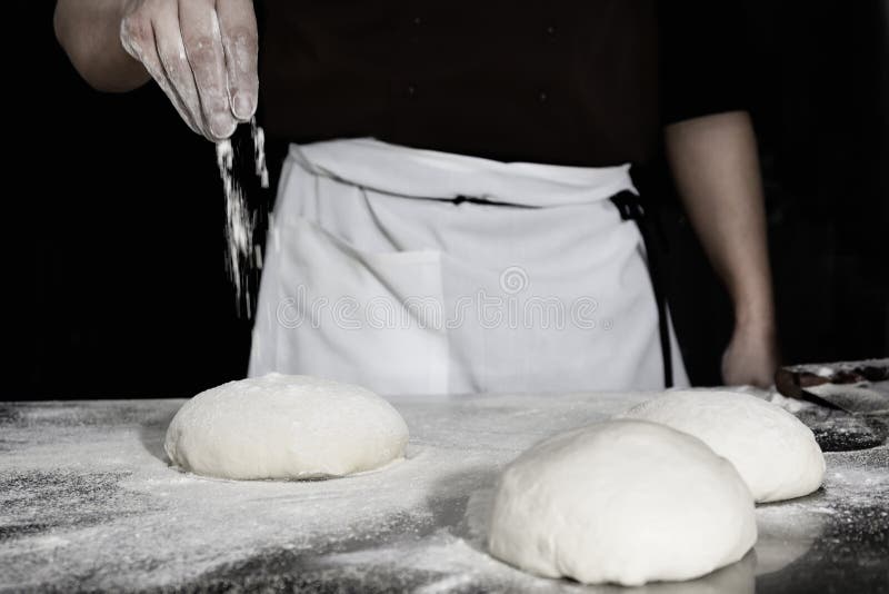 Chef Prepares the Dough with Flour To Make a Pizza. Stock Image - Image ...