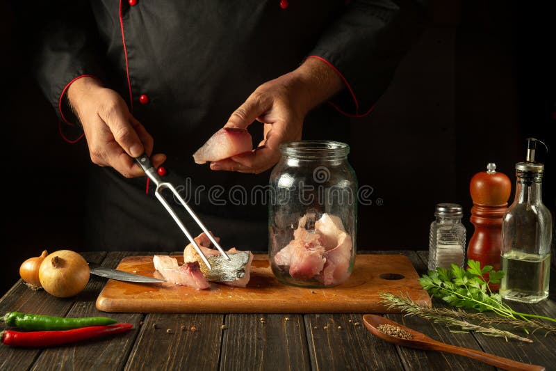 The Chef Prepares Fresh Bighead Carp Fish. Getting Ready To Cook ...