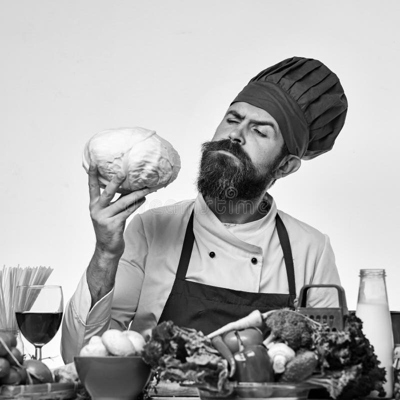 Chef Prepares Meal. Cook with Curious Face in Burgundy Uniform Stock ...