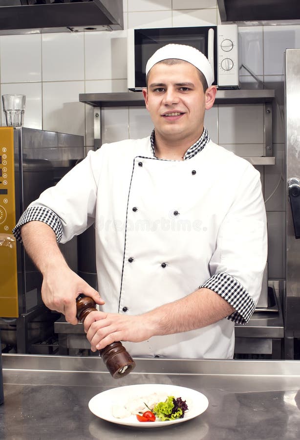 Chef prepares meal stock photo. Image of trainee, standing - 38704298