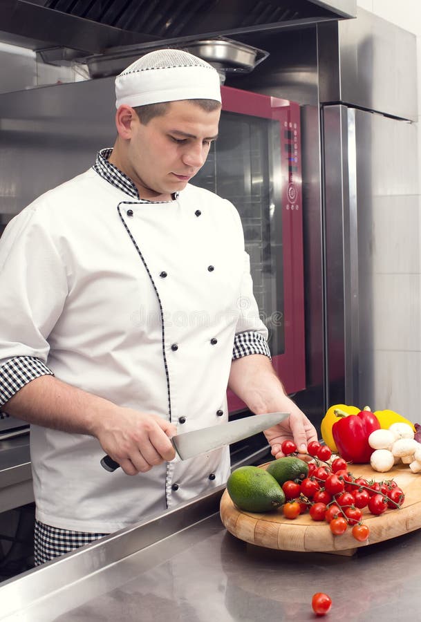 Chef prepares a meal stock photo. Image of smiling, apron - 35124584