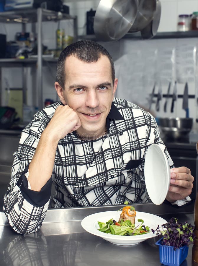Chef prepares a meal stock image. Image of apron, cooking - 48336957