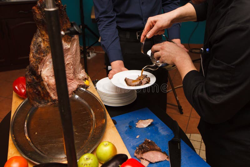 The Chef Prepares a Meat Dish from the Wild Boar Stock Image - Image of ...