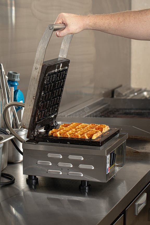 Chef Preparing Belgian Waffle in Cafe Kitchen Stock Photo - Image of ...