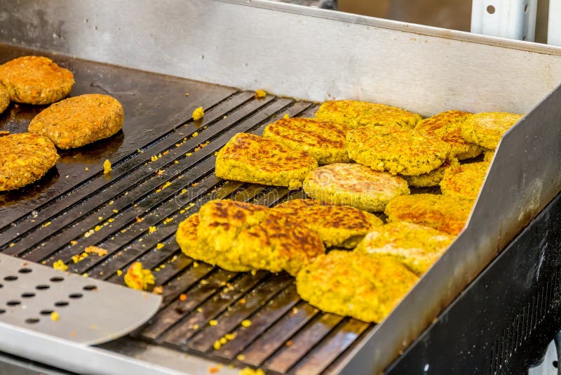 Chef preparing a burger stock photo. Image of dish, industrial - 77949876