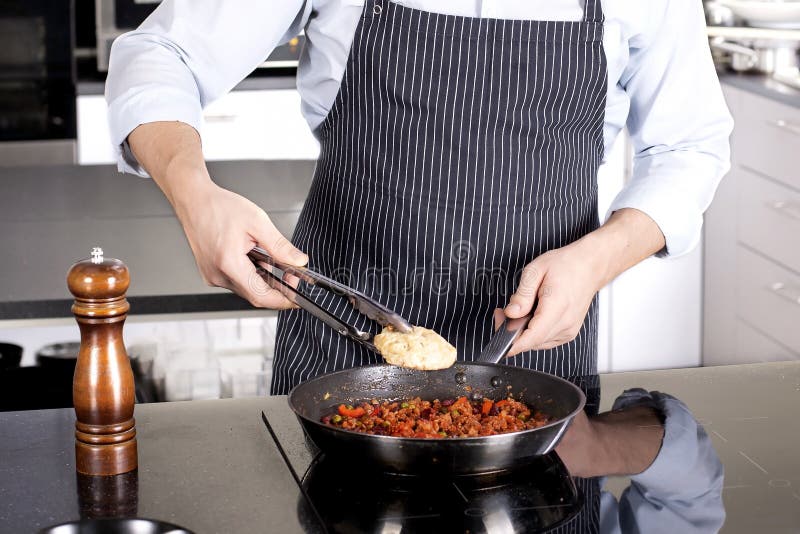 Chef Preparing Dishes in a Frying Pan Stock Photo - Image of frying ...