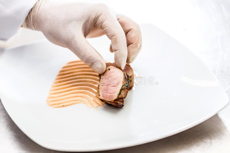 Chef preparing starters stock photo. Image of prepare - 250679180