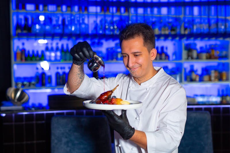 Chef Preparing Ludo in a Restaurant for Guests Stock Photo - Image of ...