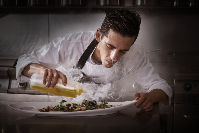 Chef Preparing Octopus in Kitchen with Smoke Stock Image - Image of ...