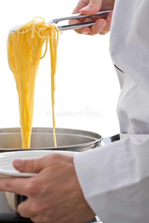 Chef Cooking Pasta, Chef Serves Spaghetti Carbonara on the Plate in the ...