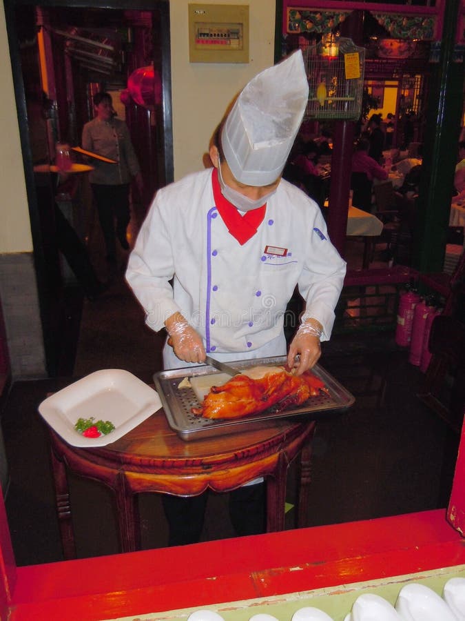 Chef preparing Peking duck editorial stock image. Image of peking ...