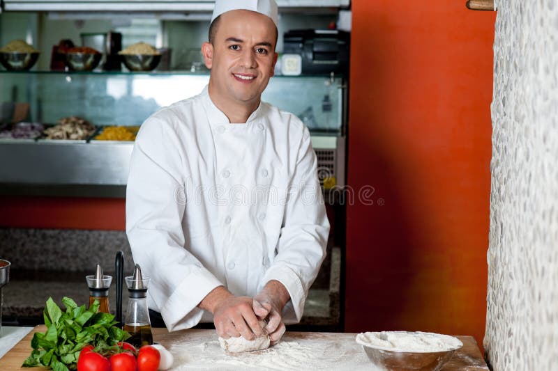 Chef preparing pizza base stock photo. Image of cookery - 37009098