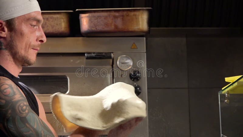 Chef is spinning pizza stock video. Video of bake, dough - 129294563