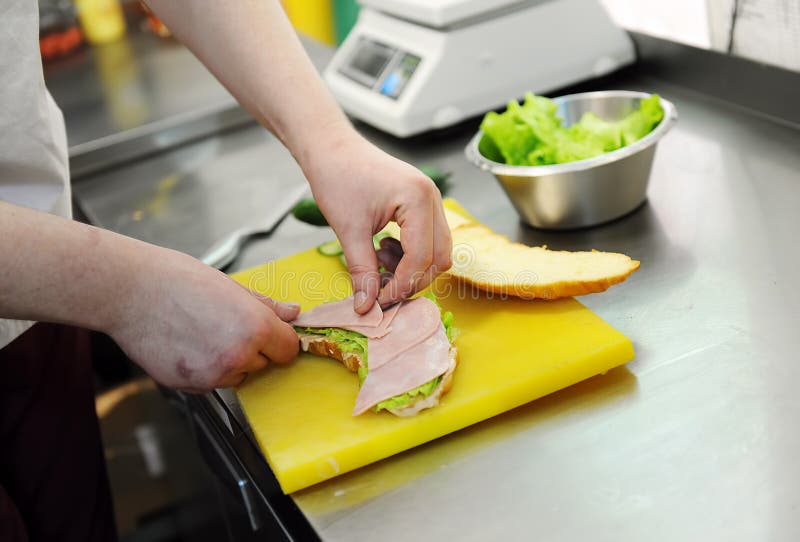 Chef preparing a sandwich stock photo. Image of kitchen - 66123708