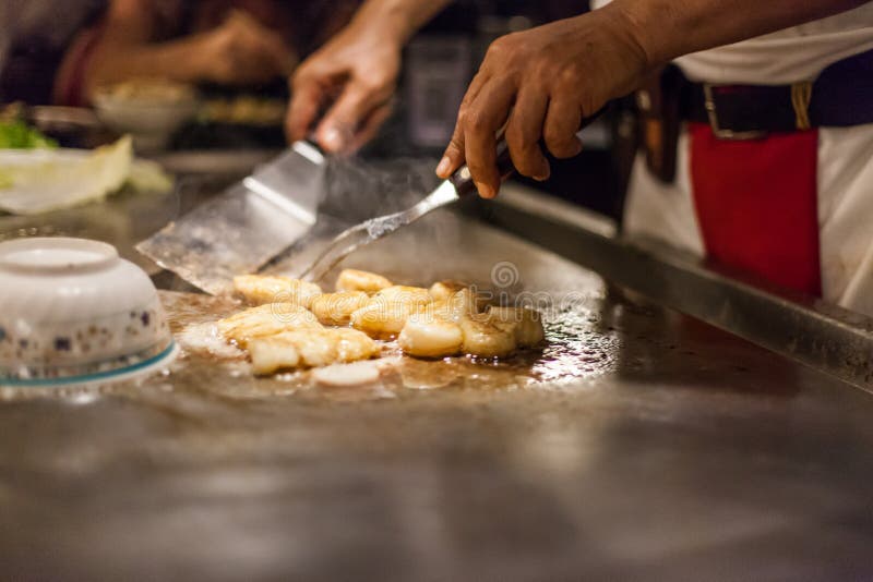 Chef preparing scallops stock image. Image of grill, fixed - 35654517