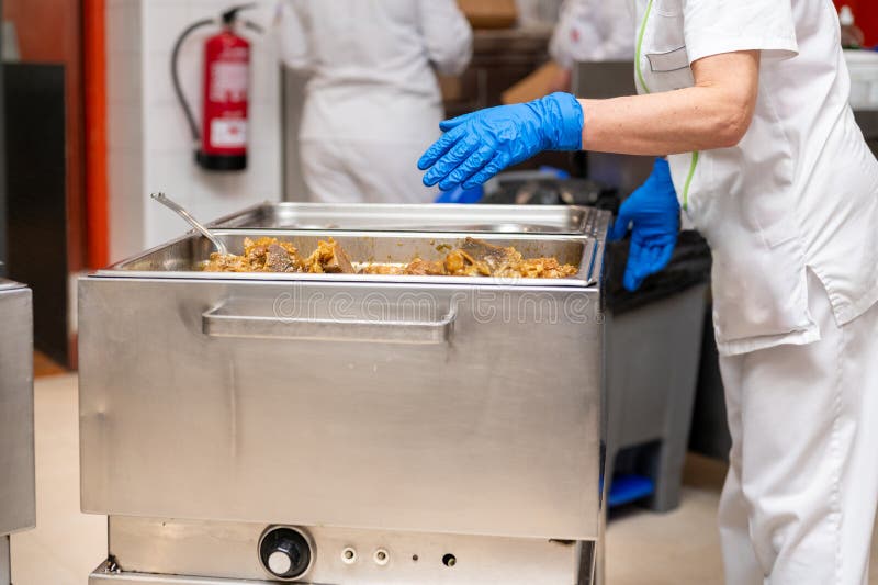 Chef Preparing the Self-service Buffet at the Restaurant Stock Photo ...