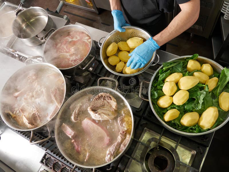 Chef Preparing a Stew in the Kitchen, Top View, No Faces Shown Stock ...