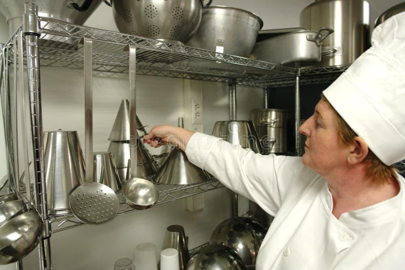 Chef cooking in kitchen stock photo. Image of professional - 2107230