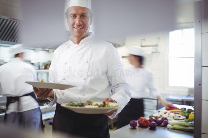 Chef Presenting His Food Plates Stock Photo - Image of food, dinner ...