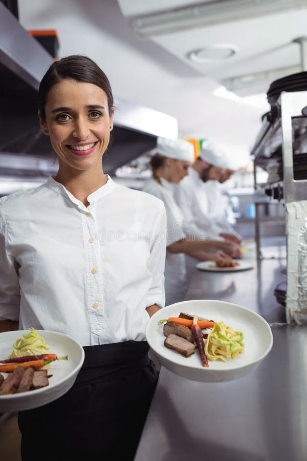 Chef Presenting His Food Plates Stock Photo - Image of cooked, culinary ...