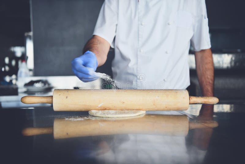 Chef with Protective Coronavirus Face Mask Preparing Pizza Stock Image ...