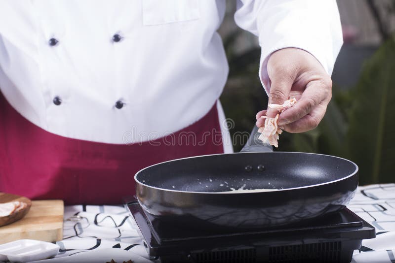 Chef Putting Bacon To the Pan Cooking Spaghetti Carbonara Stock Image ...