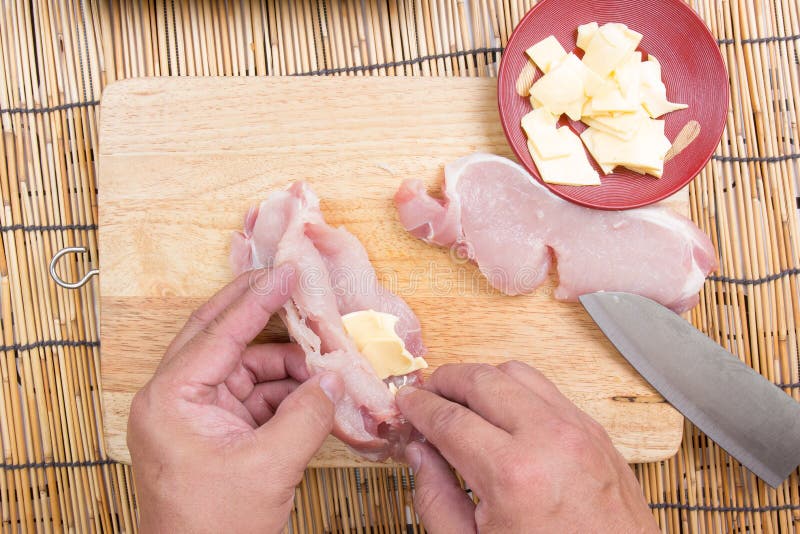 Chef Putting Cheese in Pork Stock Photo - Image of asian, white: 74685822
