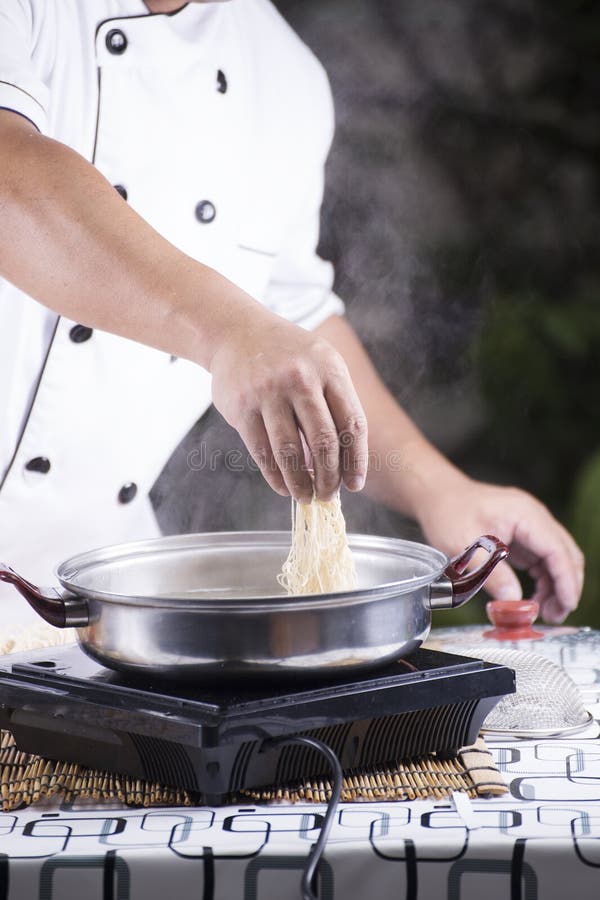 Chef Putting the Noodle To the Pot Stock Photo - Image of class, asian ...
