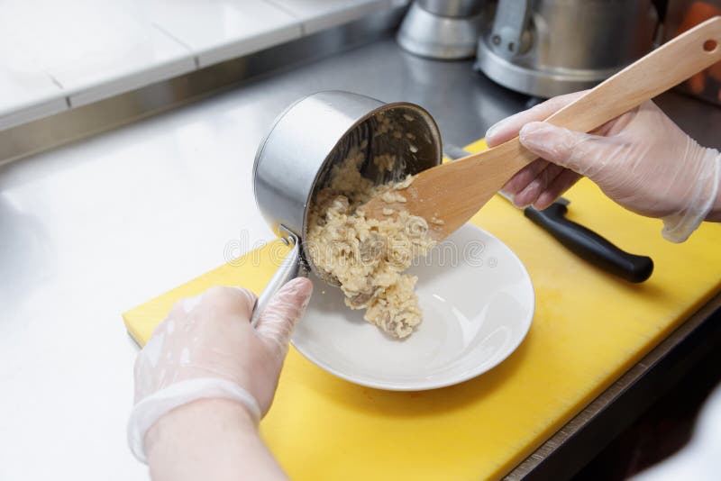 Chef is Putting Risotto in Plate Stock Image - Image of rice, italian ...